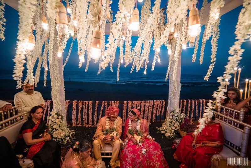A Gorgeous Seaside Wedding With A Bride In A Pretty Pink Lehenga ...