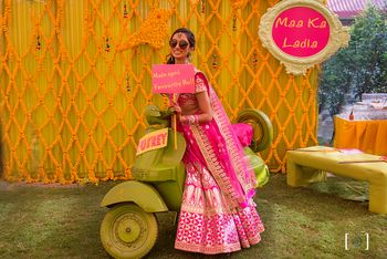 Photo of orange and pink mehendi decor theme