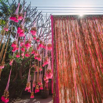Photo of Unique mehendi theme in light pink