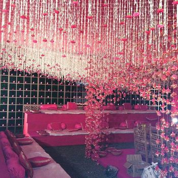 Photo of Unique mehendi theme in light pink