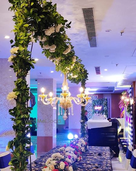 Photo of Grand entrance decor with floral peacocks