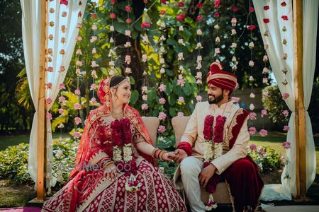 Photo of bright pink and light blue theme mehendi decor seating idea ...