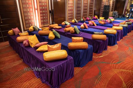 Photo of White canopy tent seating with fairy lights.