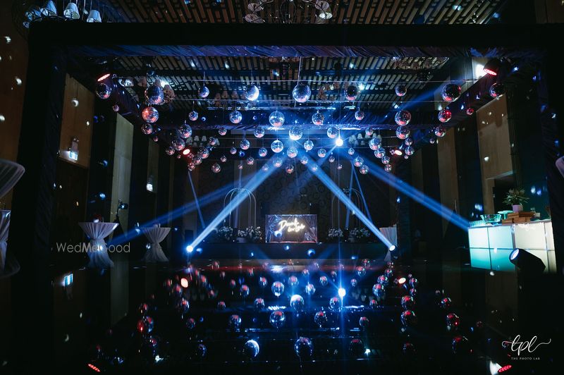 Photo of Trending and edgy disco ball themed cocktail night decor elements