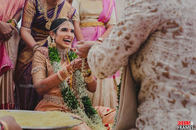 Photo of candid smiling bride shot
