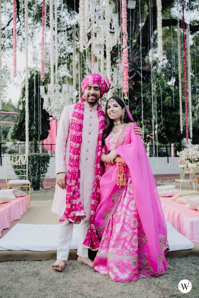 Photo of bride and groom in matching outfits for their minimal wedding ...