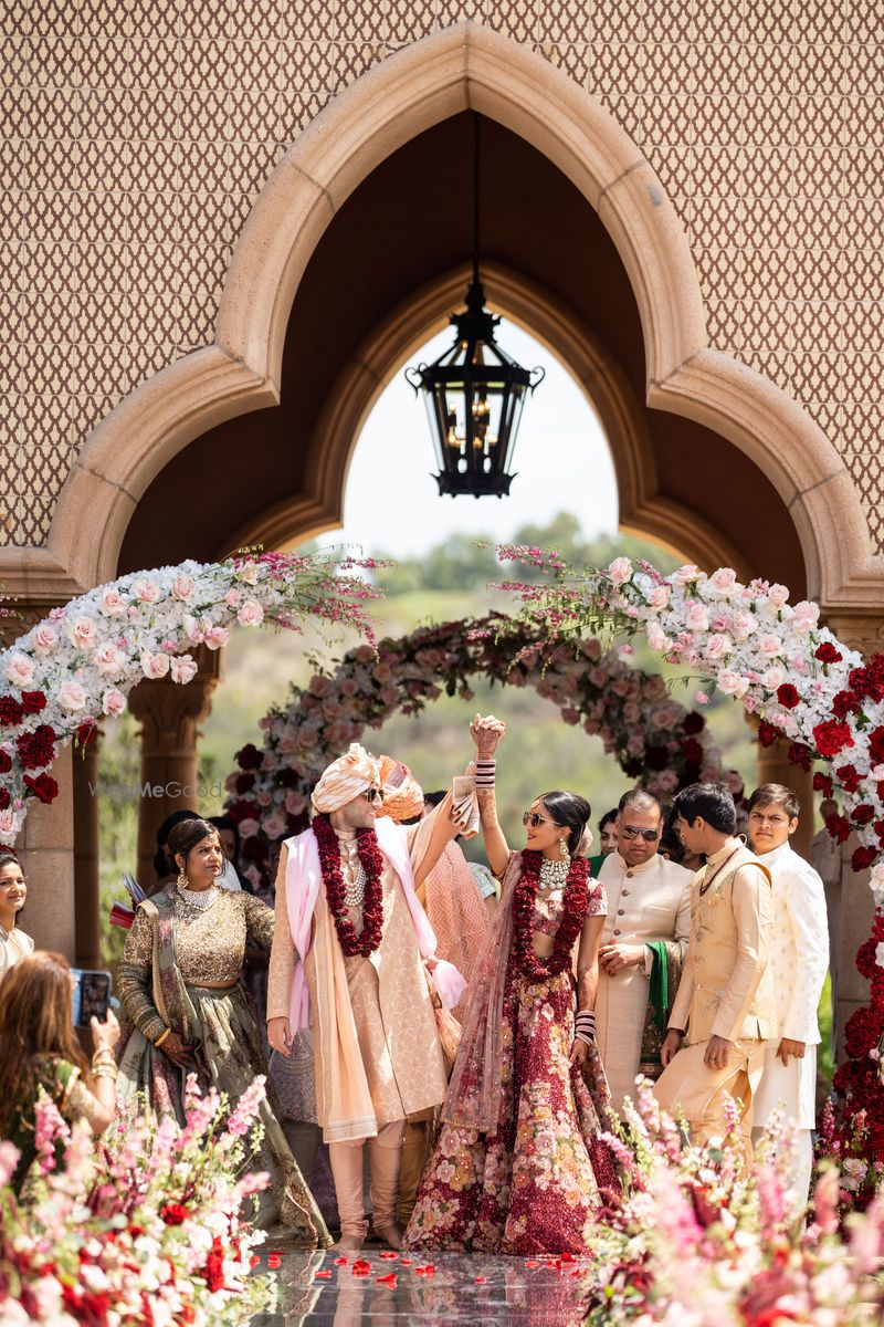 Photo of cute couple shot post pheras with bride and groom wearing ...