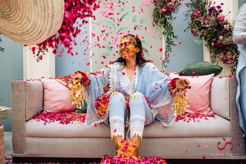 Photo of Happy Haldi portrait of a bride