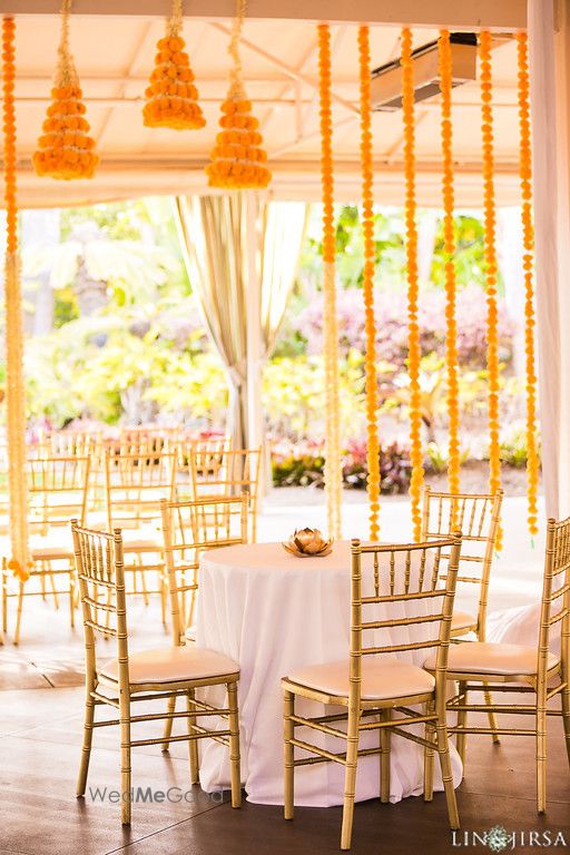 Photo of Gold and marigold decor theme for table setting