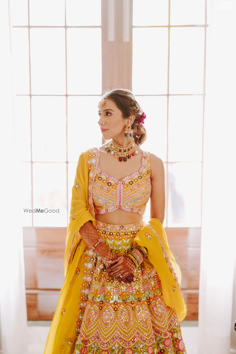 Photo of punjabi colorful mehendi bridal look