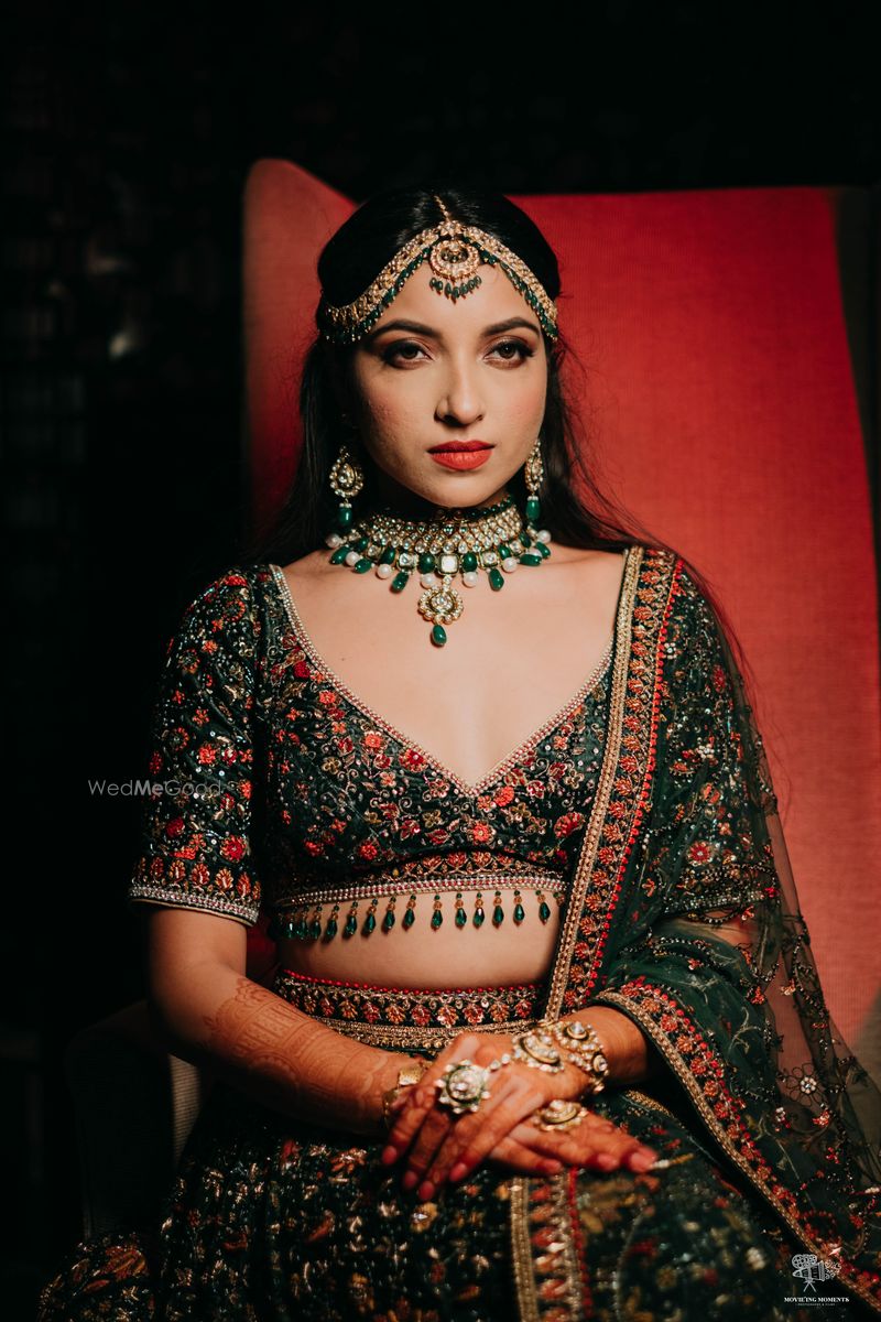 Photo of mehendi bridal look with a blouse with tassels