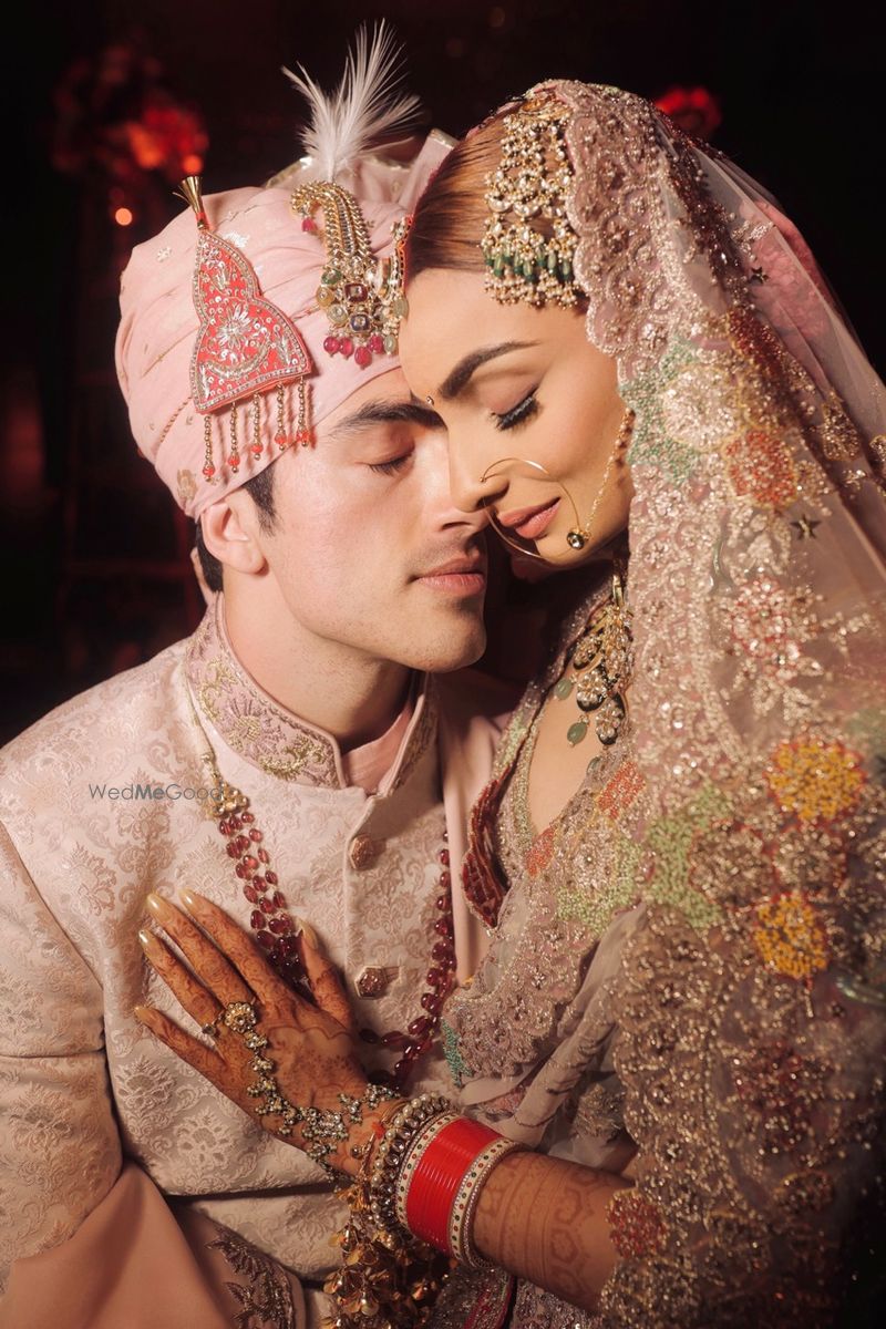 Photo of Serene couple shot with the bride in a pastel lehenga and ...