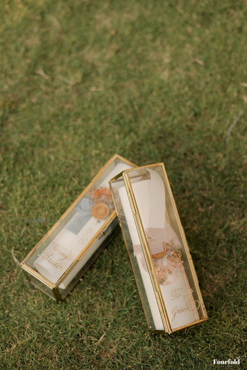 Photo of Gorgeous glass box encased with love letters from the bride ...