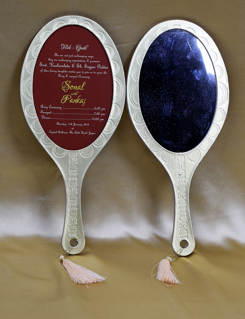 Photo of Wedding card shaped like hand mirror