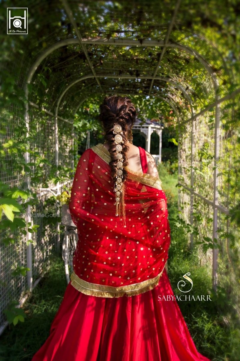 Photo of Bridal braid with hair jewellery