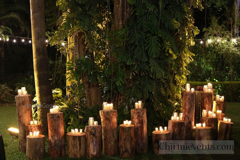 Photo of Wooden and candle lit night decor