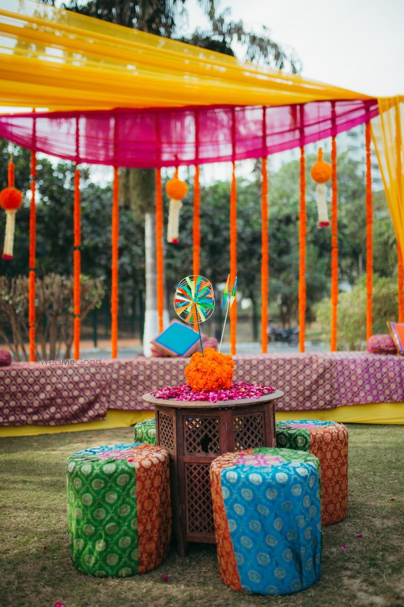 Photo of Pinwheel table centerpieces for Mehendi