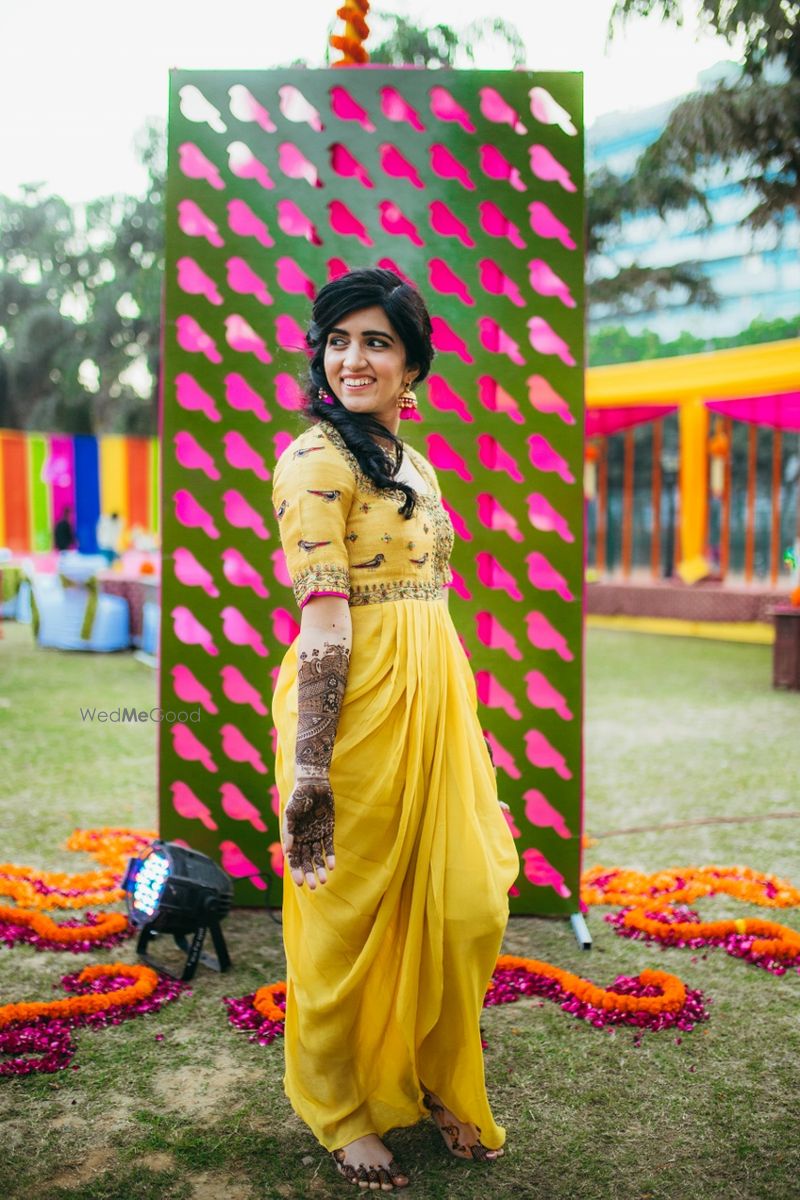 Photo of Mehendi Photo Booth with bird cutouts