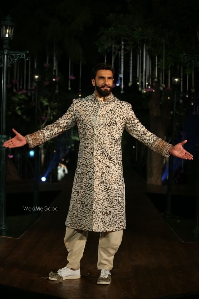 Photo of Embellished gold groom sherwani