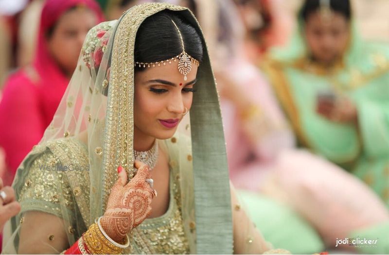 Photo of Offbeat seafoam sikh bridal lehenga