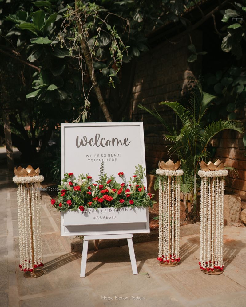 Photo of Beautiful wooden entrance board to welcome guests for the wedding