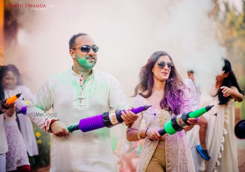 Photo of Mehendi holi party couple portrait