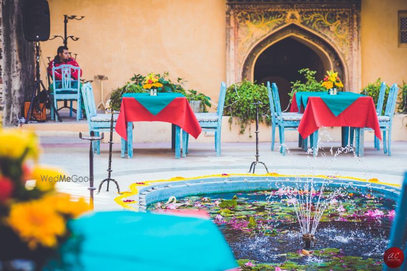 Photo of blue and red table settings