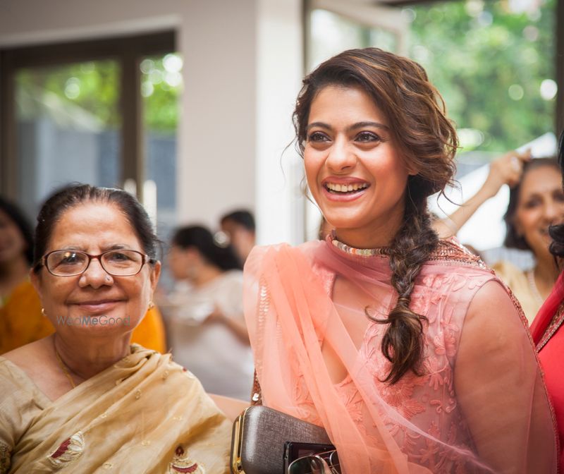 Photo of Kajol at wedding with side braid