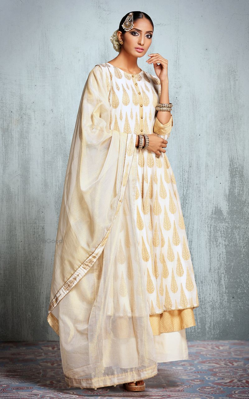 Photo of White and Gold Double Layered Suit