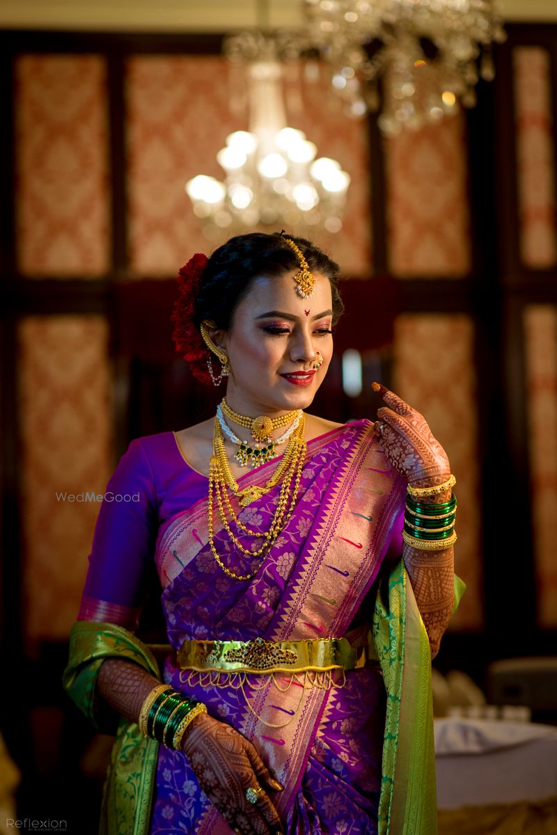 Photo Of A Marathi Bride In A Purple Saree With Gold Jewellery Photo Of A Marathi Bride In A Purple Saree With Gold Jewellery