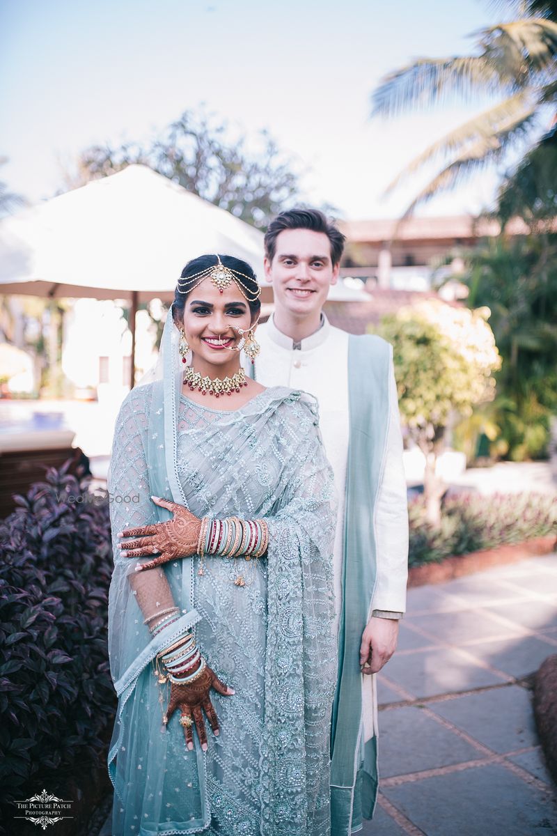 Photo of A couple in color-coordinated outfits