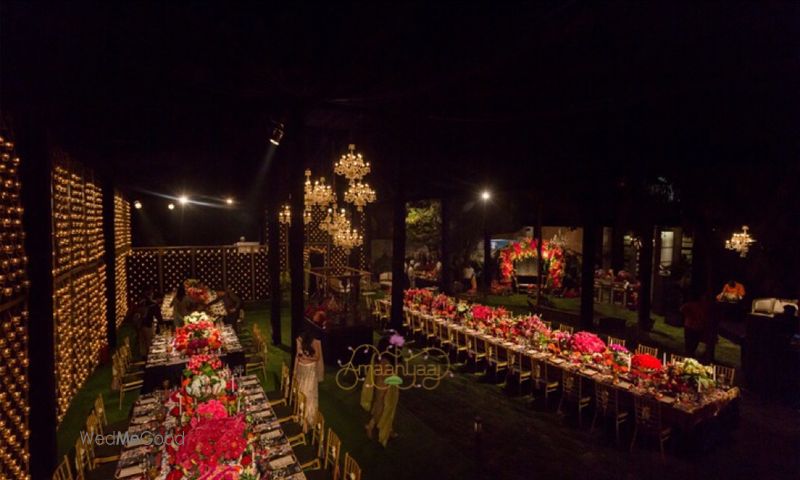 Photo of Night time wedding dinner setup