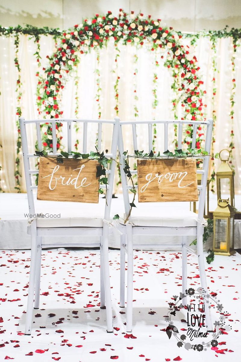 Photo of White Seating Dedicated to Couples