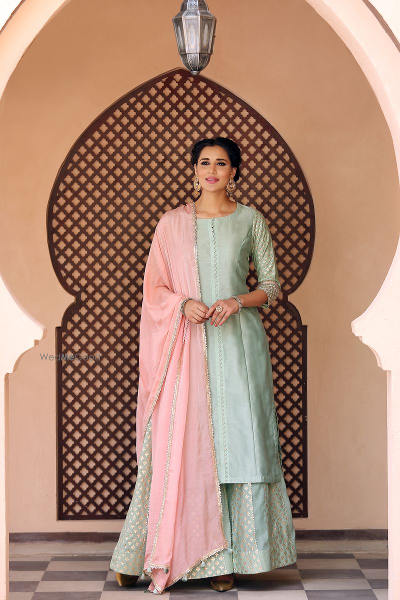 Photo of Aqua blue and pastel pink pallazos