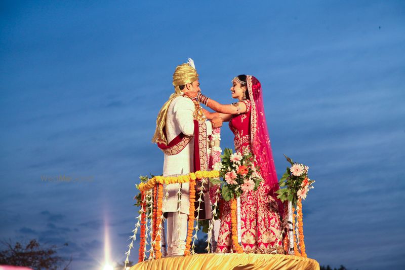 Photo of Var Mala on a Podium