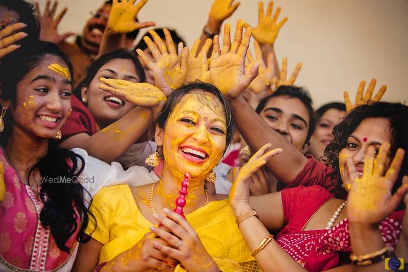 Photo of Fun haldi bridal party photo with bride
