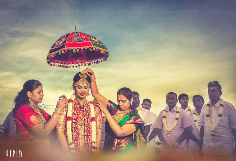 Photo of South Indian Bridal Entry Under Traditional Umbrella