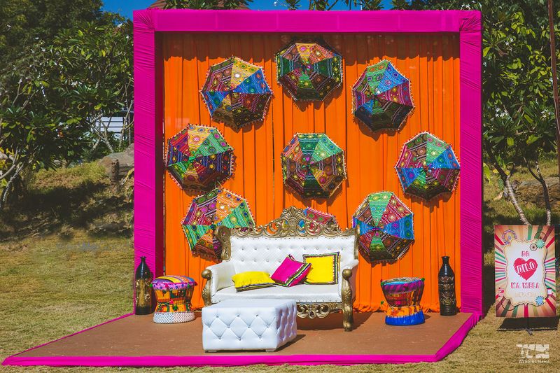 Photo of Mehendi Photo Booth idea with hanging umbrellas