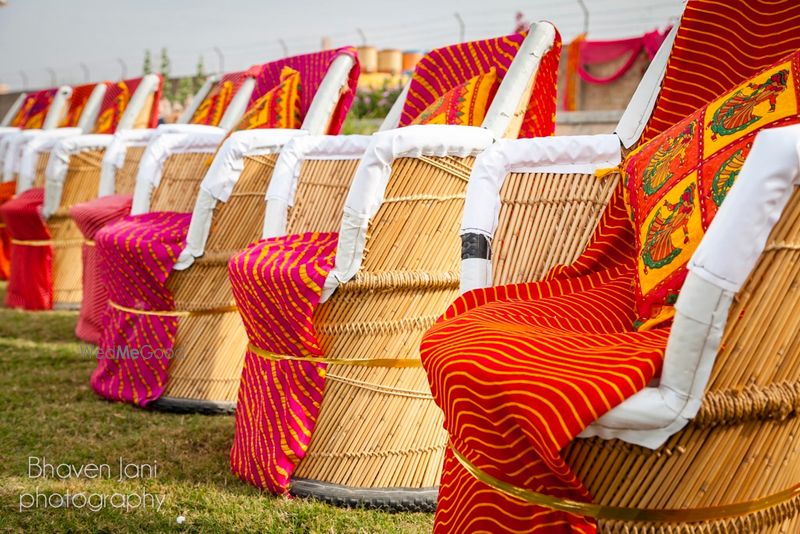 Photo of Rajasthani themed seating with bandhini moodas