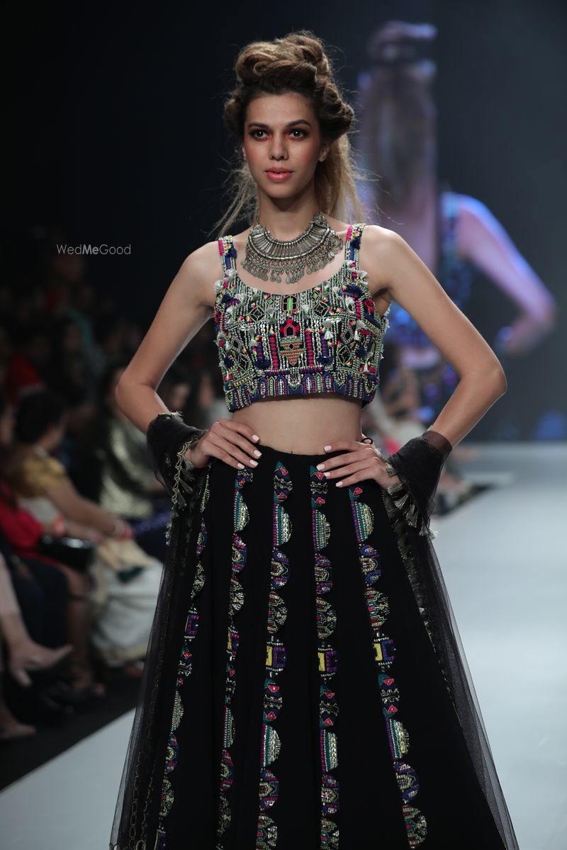 Black choli with georgette lehenga by Payal Singhal