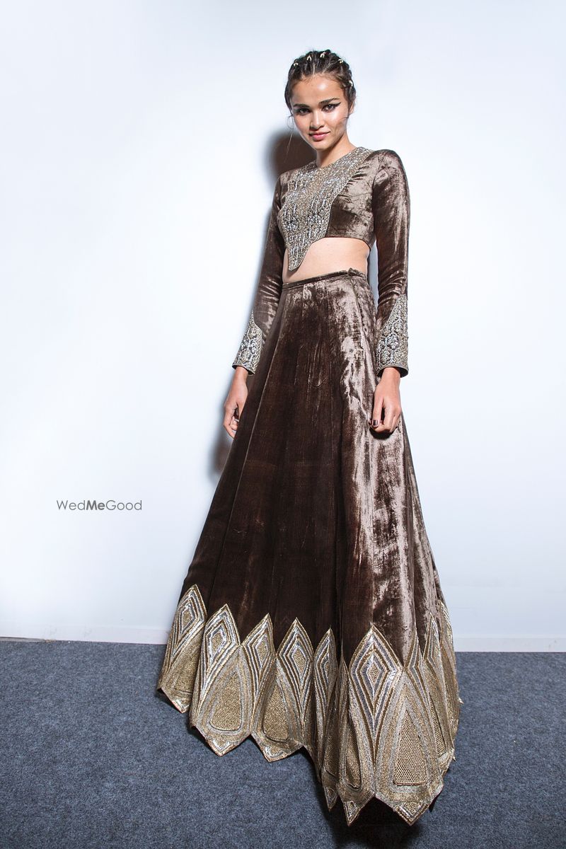 Forest green velvet choli and lehenga by Payal Singhal
