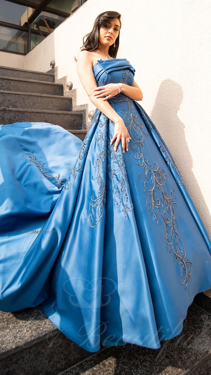 Blue gowm with inverted side pleats by Bride & Beautiful