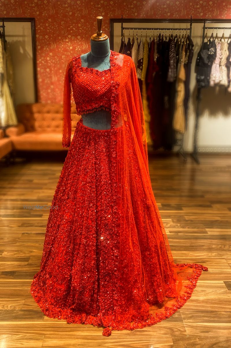 The elegant red sequin lehenga with handwork is the epitome of elegance ...