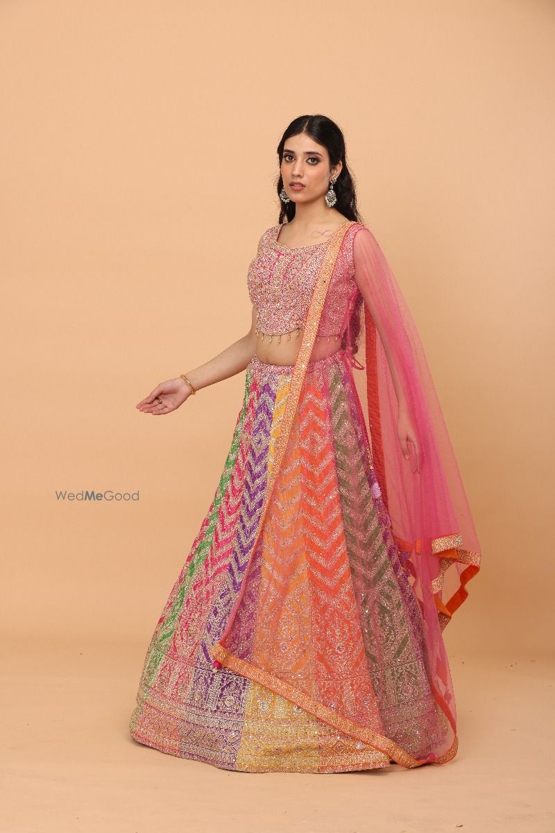 our Multicolored Lehenga This exquisite ensemble blends a spectrum of ...