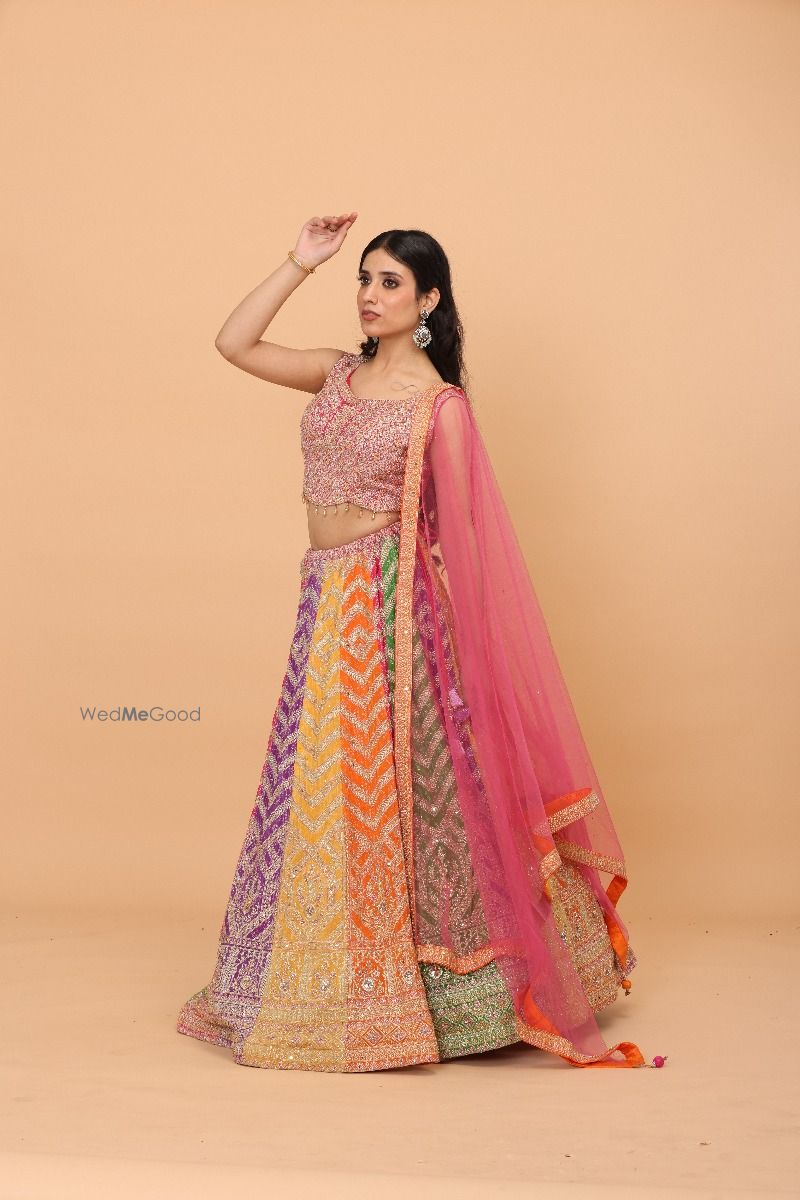 our Multicolored Lehenga This exquisite ensemble blends a spectrum of ...